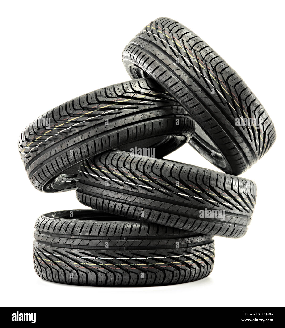 Four new black tires isolated on white Stock Photo - Alamy