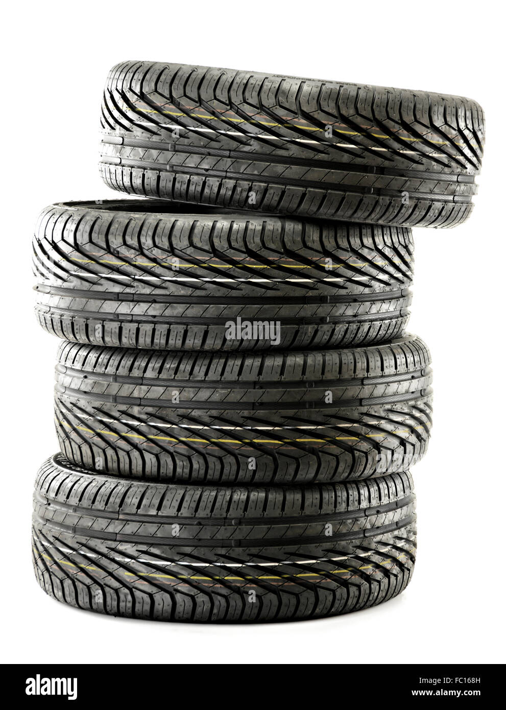 Four new black tires isolated on white Stock Photo - Alamy