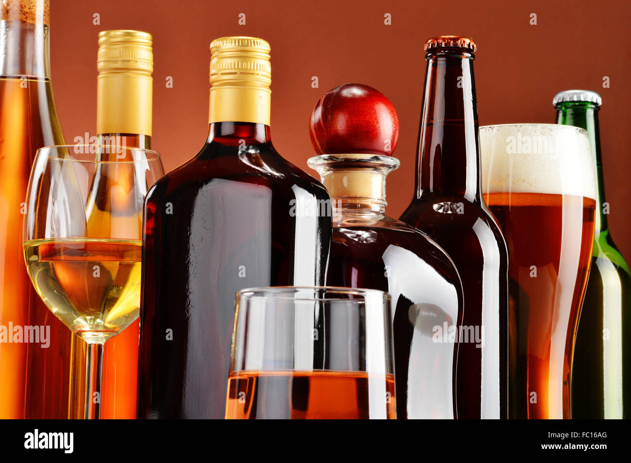 Bottles and glasses of assorted alcoholic beverages Stock Photo - Alamy