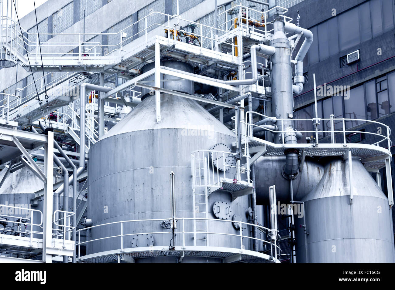 Industrial buildings and steel pipes Stock Photo - Alamy