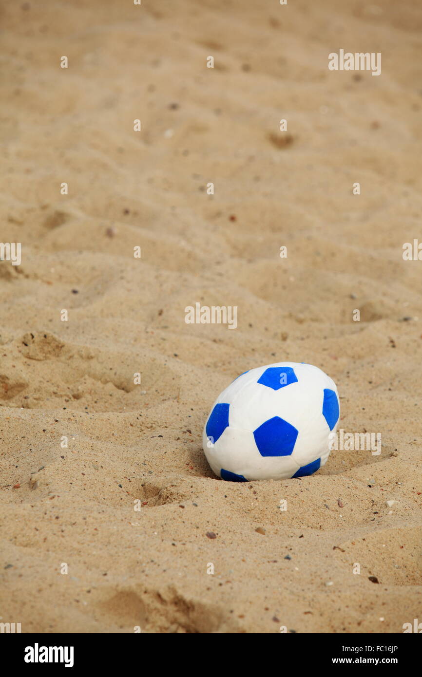 Ball on sandy beach hi-res stock photography and images - Alamy