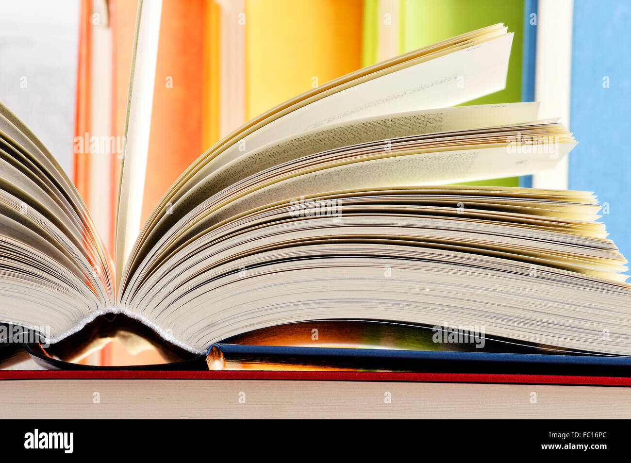 Composition with hardcover books in the library Stock Photo - Alamy