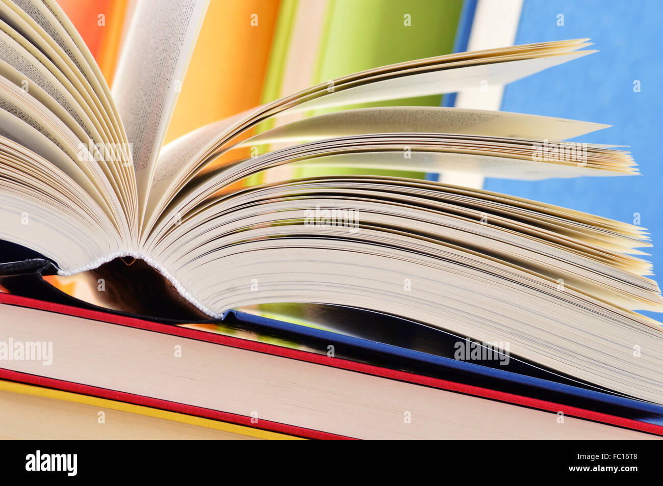 Composition with hardcover books in the library Stock Photo - Alamy