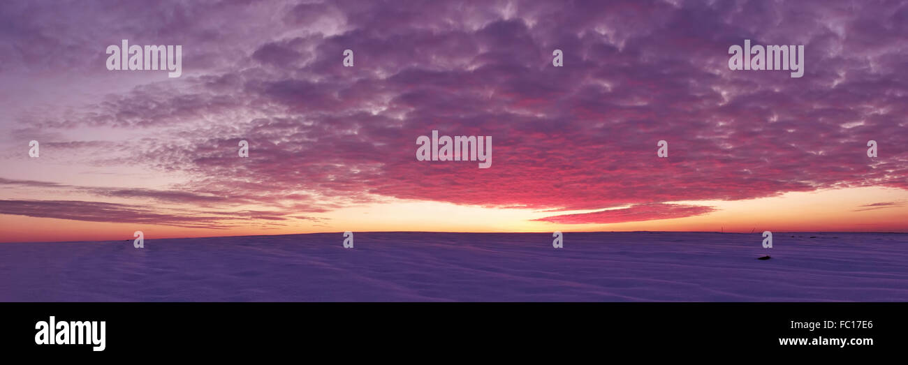 Winter Landscape with Clouds at Sunset Stock Photo - Alamy