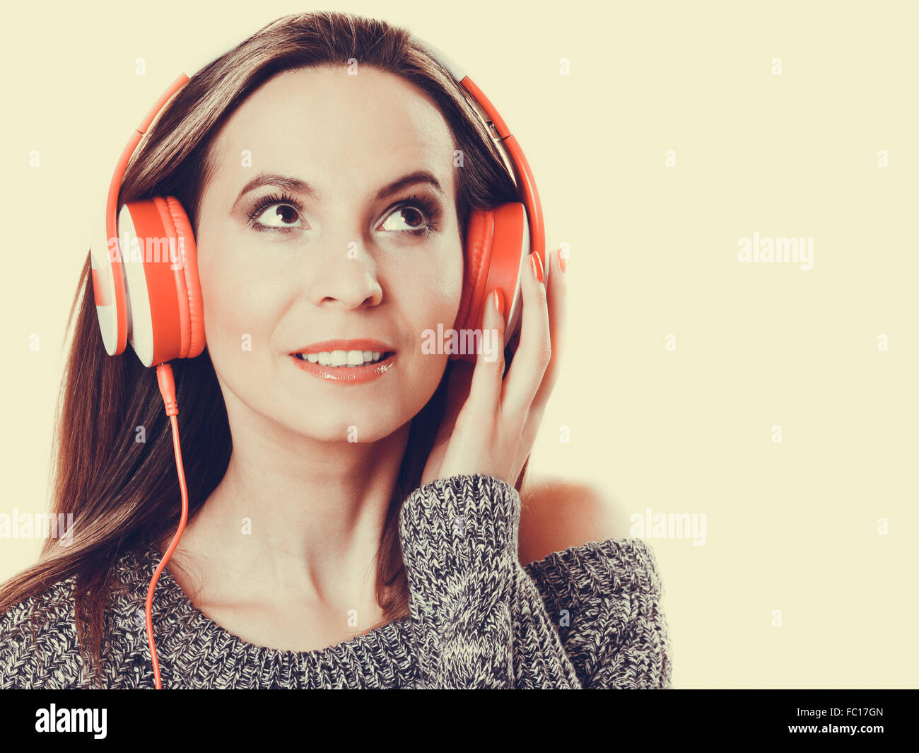 Woman with headphones listening music Stock Photo - Alamy