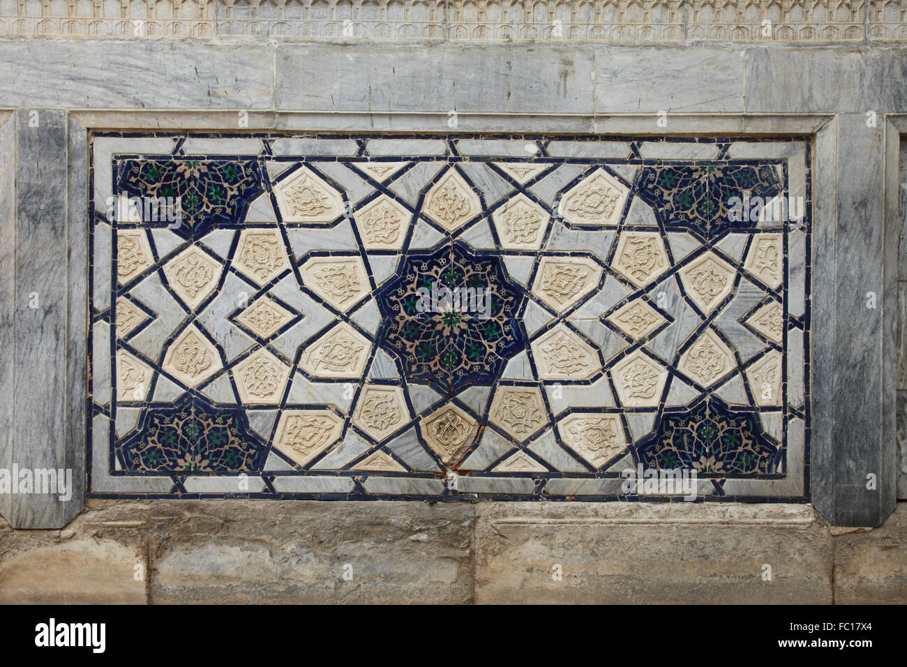 decorated tile pattern on a wall Stock Photo - Alamy