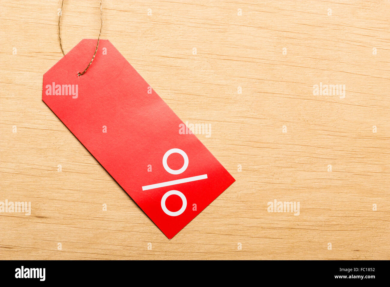 Red price label with percent sign Stock Photo - Alamy