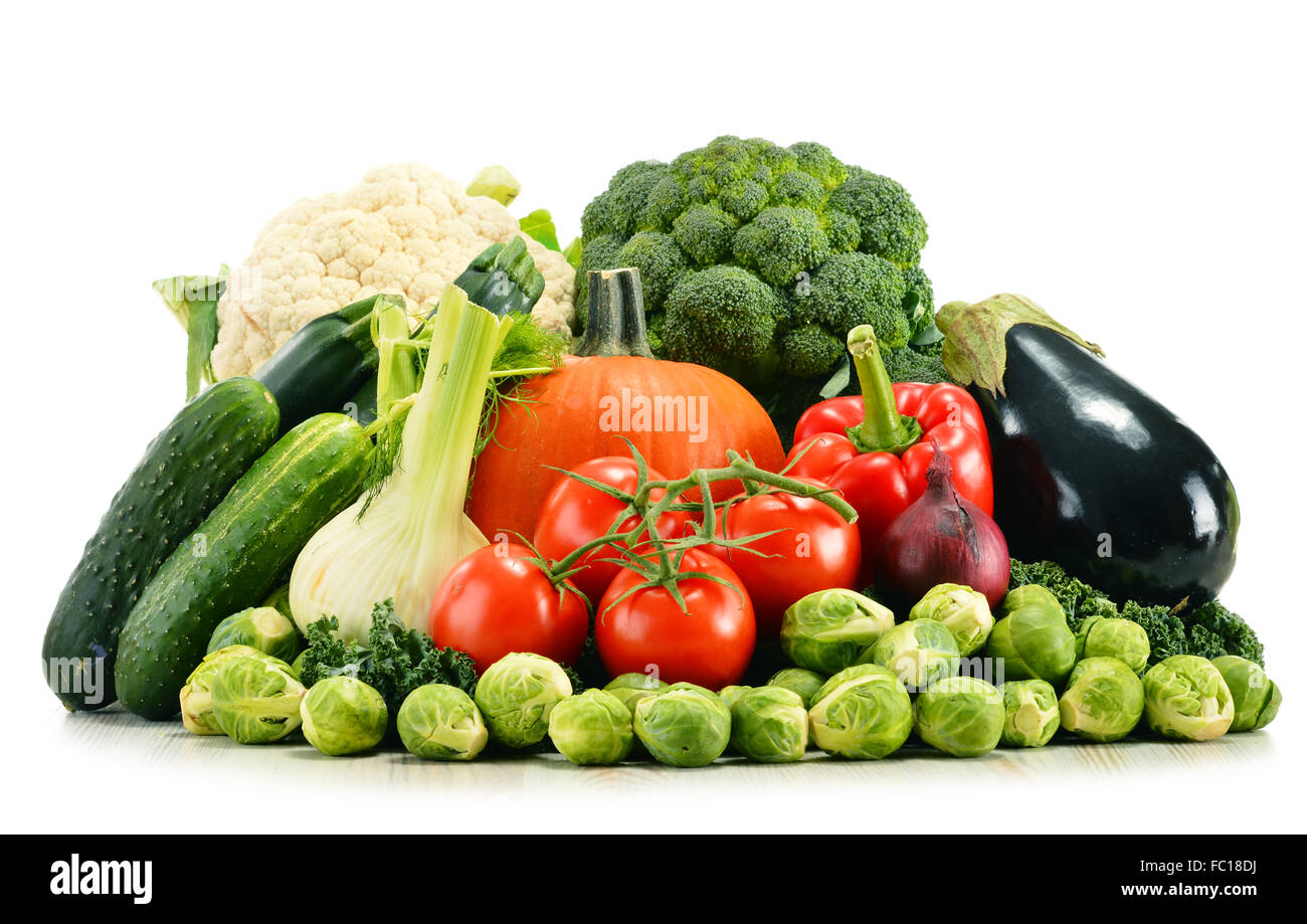 Composition with assorted raw organic vegetables isolated on white ...