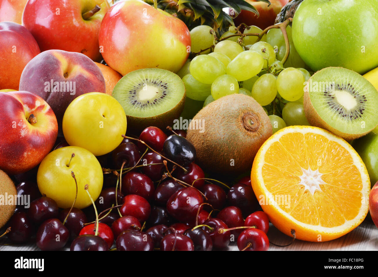Composition with variety of fresh fruits. Balanced diet Stock Photo - Alamy