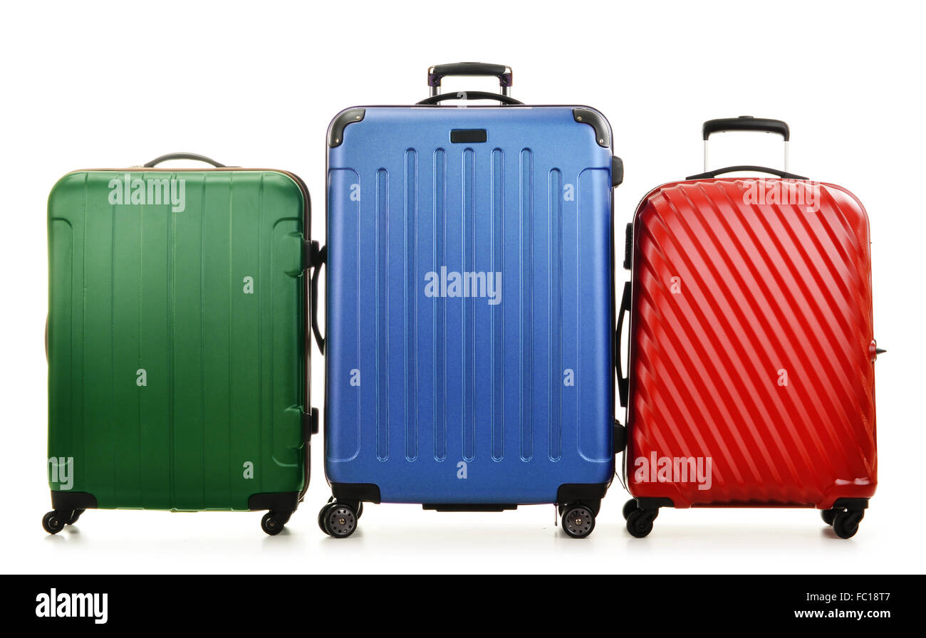 Three suitcases isolated on white background Stock Photo - Alamy