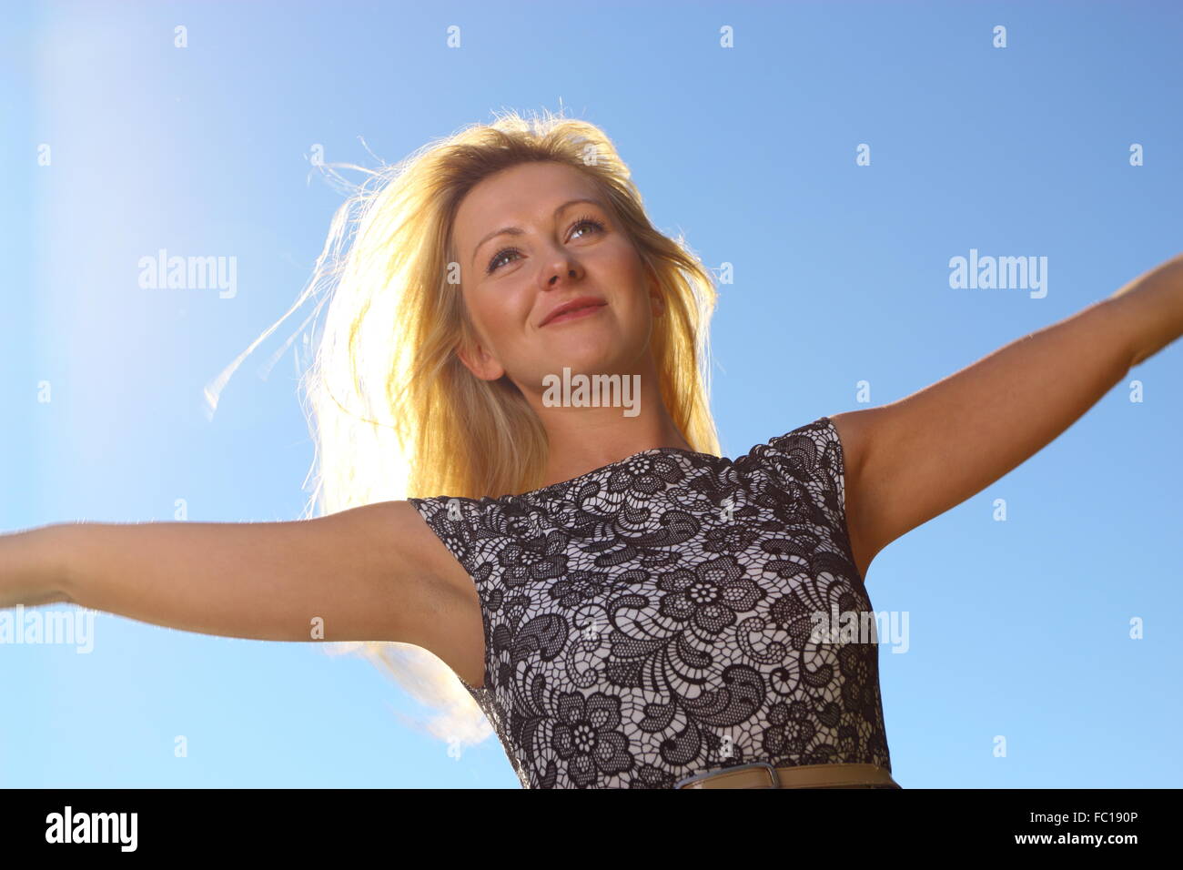 Woman wind hi-res stock photography and images - Alamy