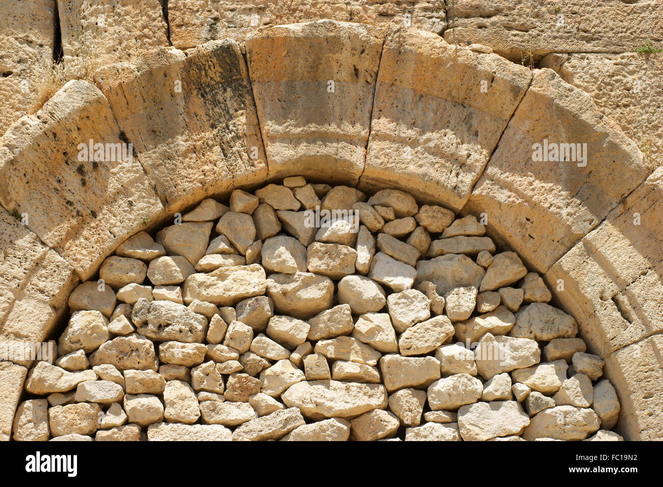 arch in stone wall Stock Photo - Alamy