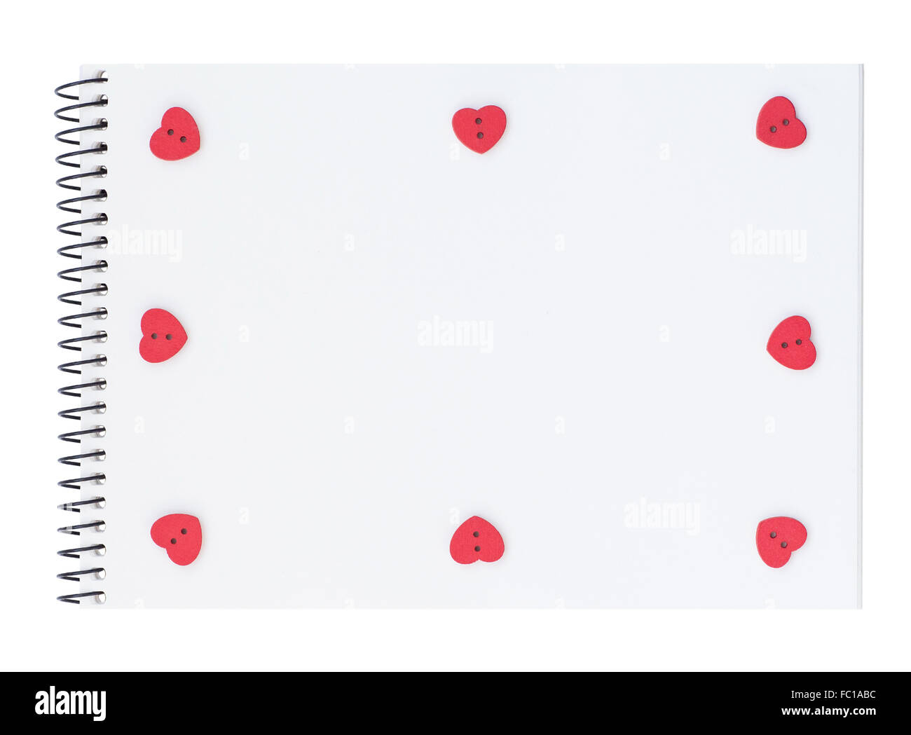 notepad with red heart shaped buttons on it Stock Photo - Alamy