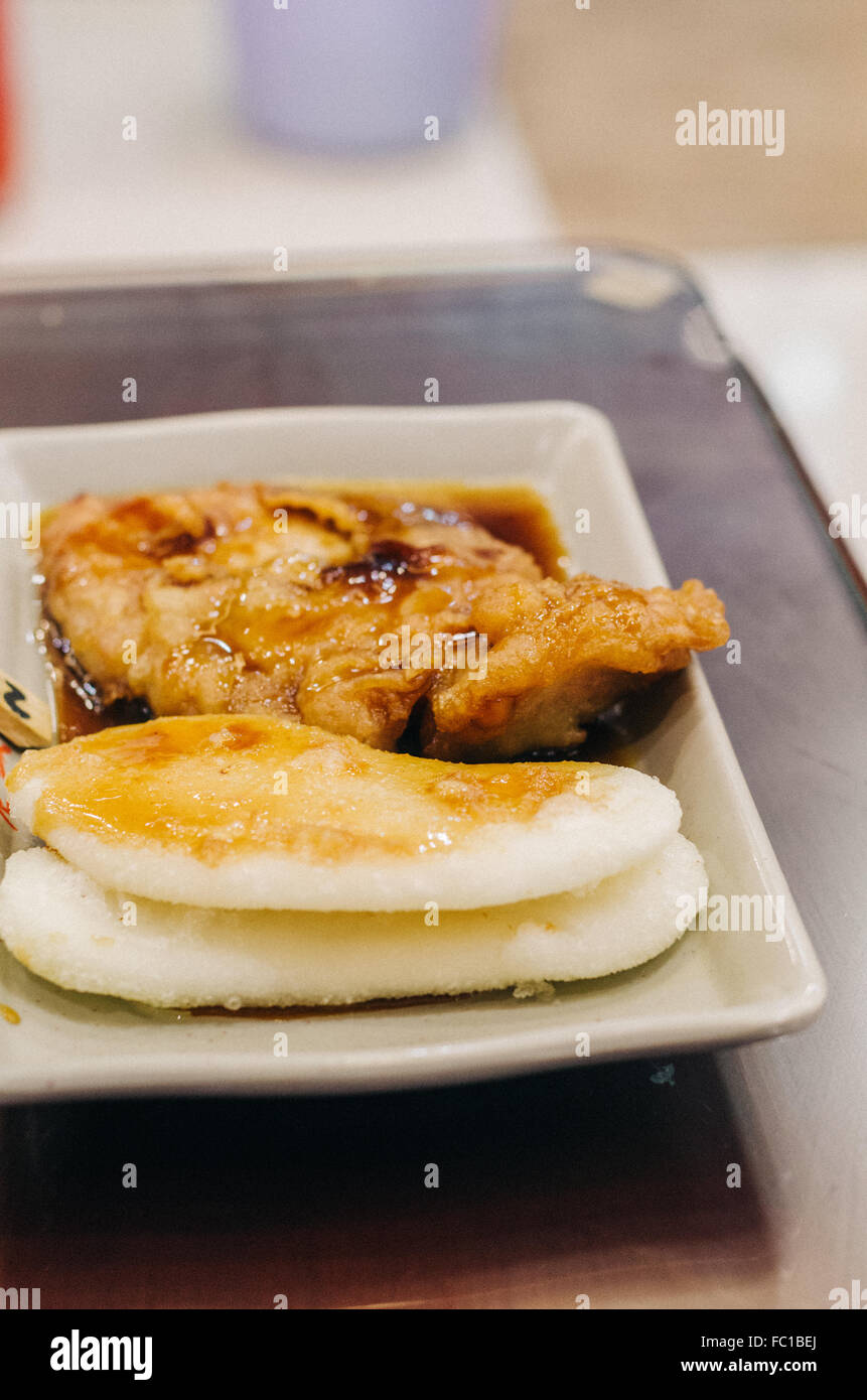shanghai sticky rice cake with pork chop Stock Photo - Alamy