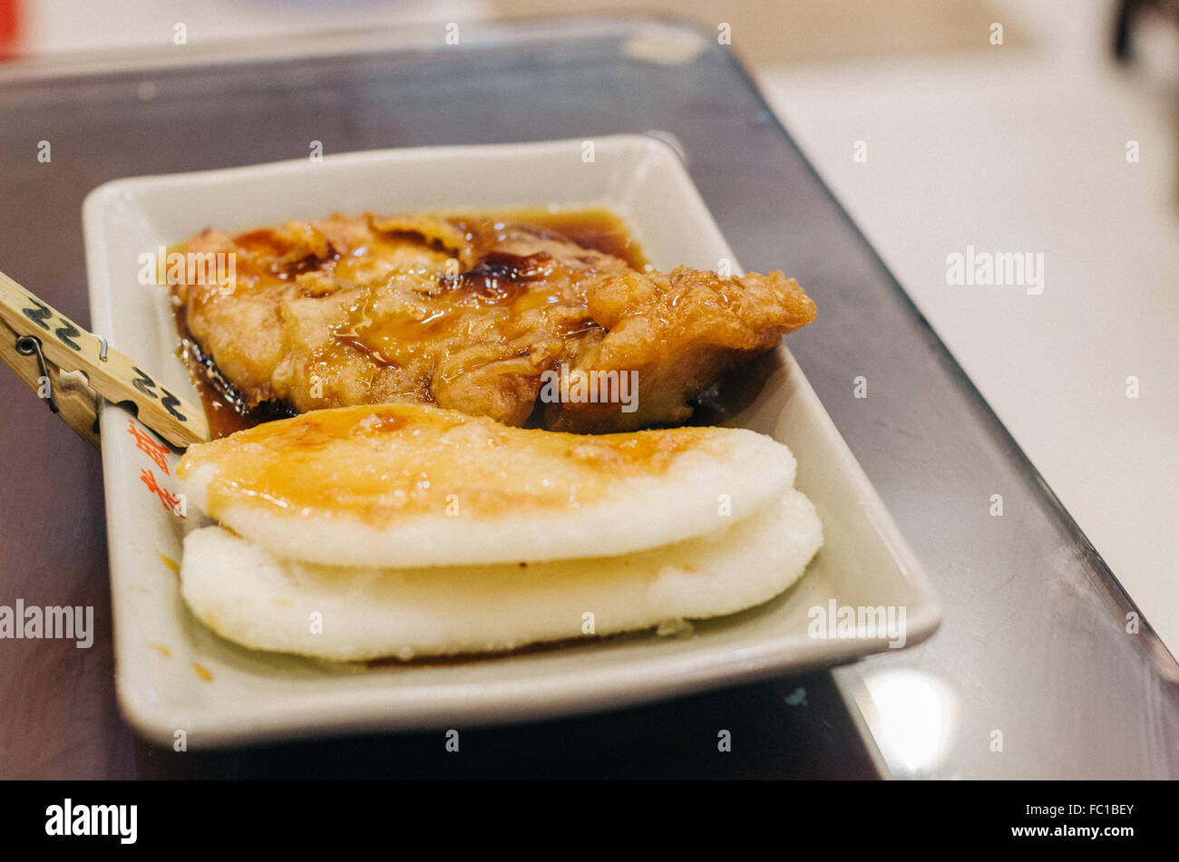 shanghai sticky rice cake with pork chop Stock Photo - Alamy