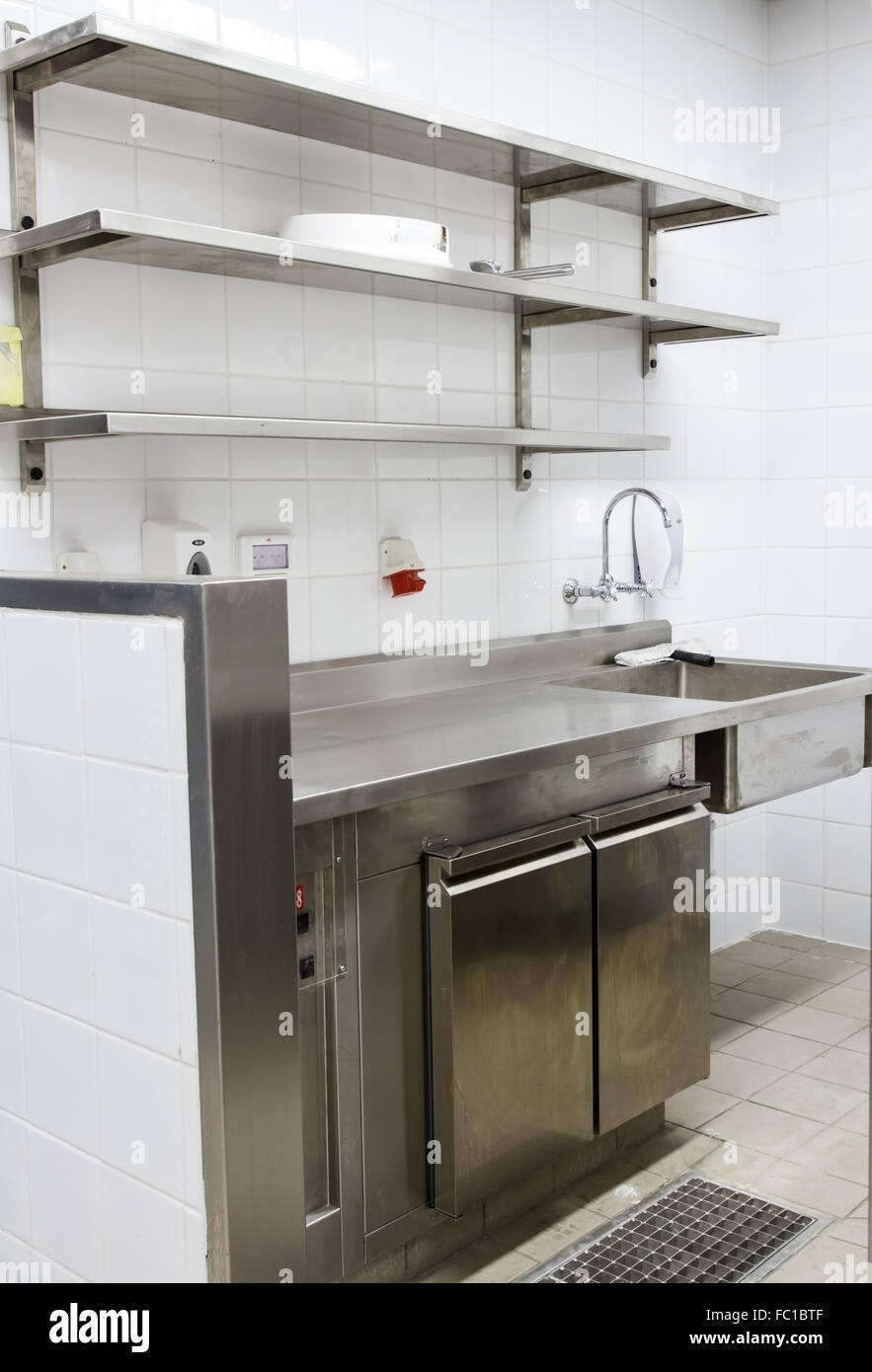 Professional kitchen, view counter in steel Stock Photo - Alamy