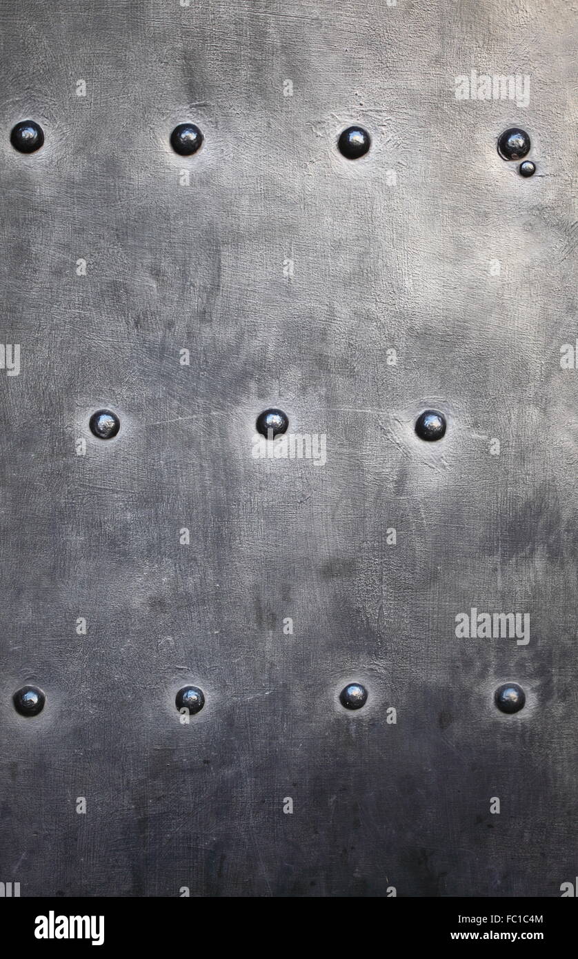 Black metal plate or armour texture with rivets Stock Photo - Alamy