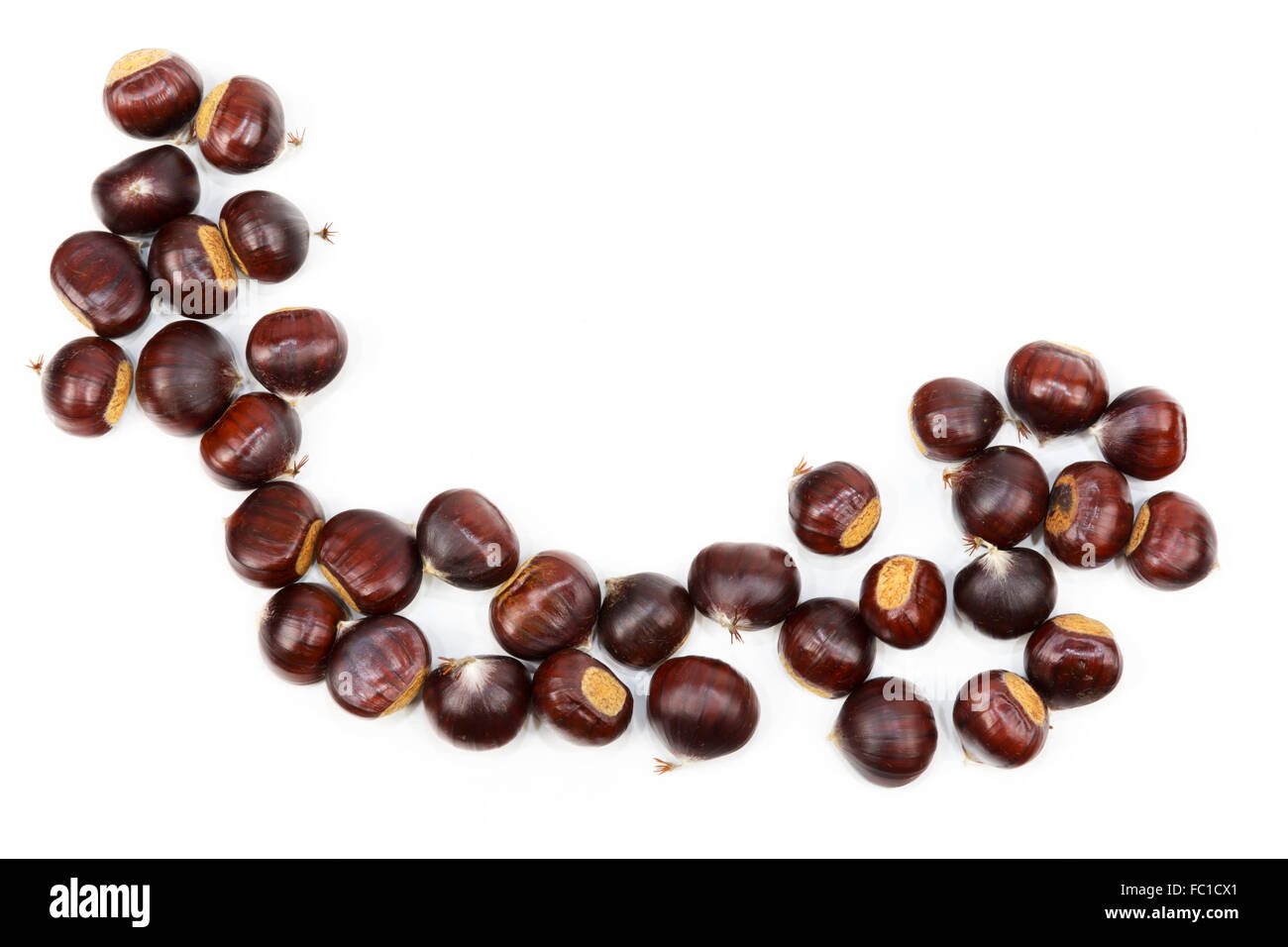 Sweet chestnuts on white background Stock Photo - Alamy