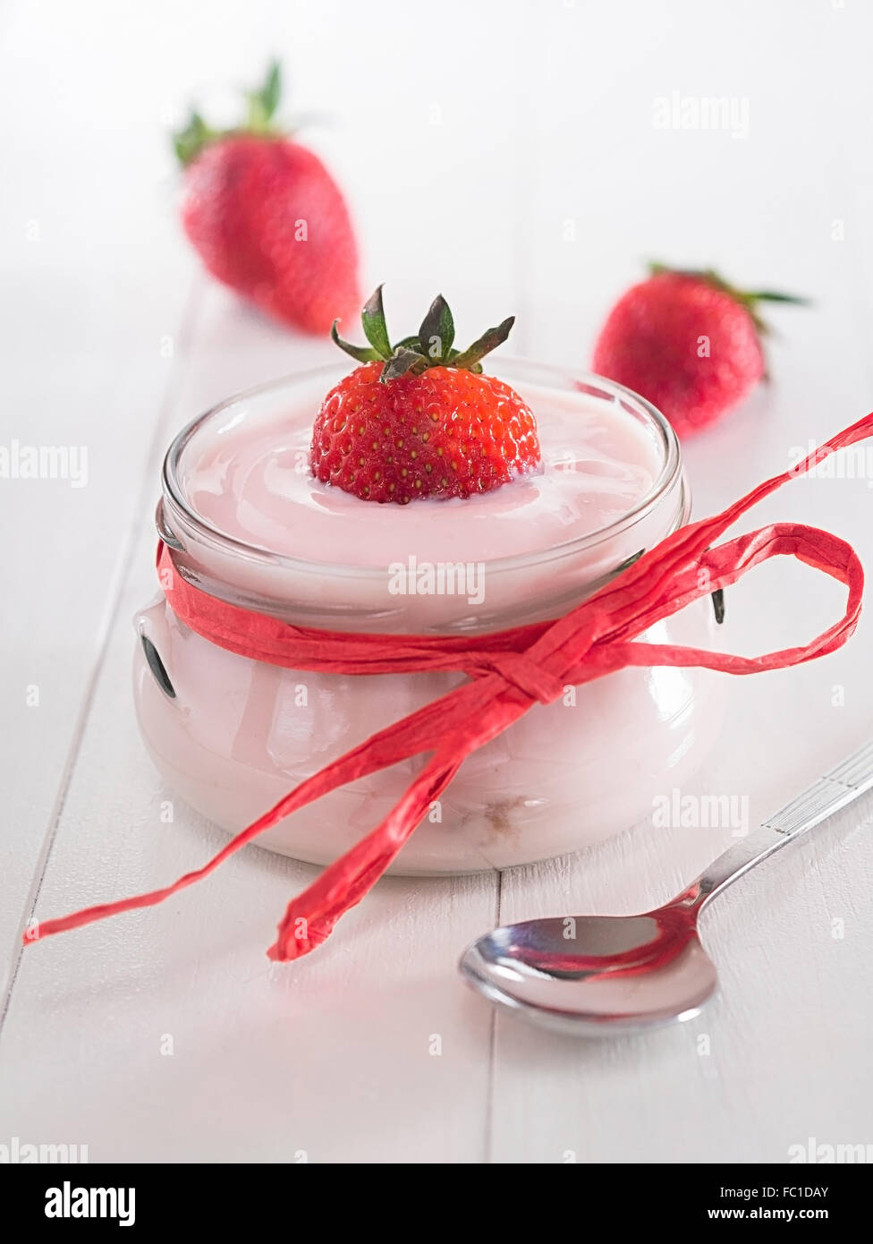 Strawberry yoghurt in a glass Stock Photo - Alamy