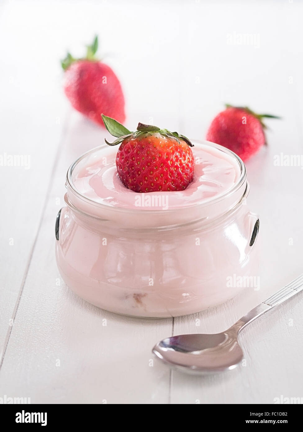Strawberry yoghurt in a glass Stock Photo - Alamy