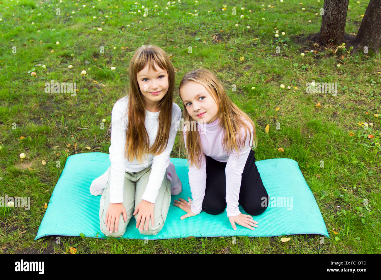 Cute two playing girls Stock Photo - Alamy
