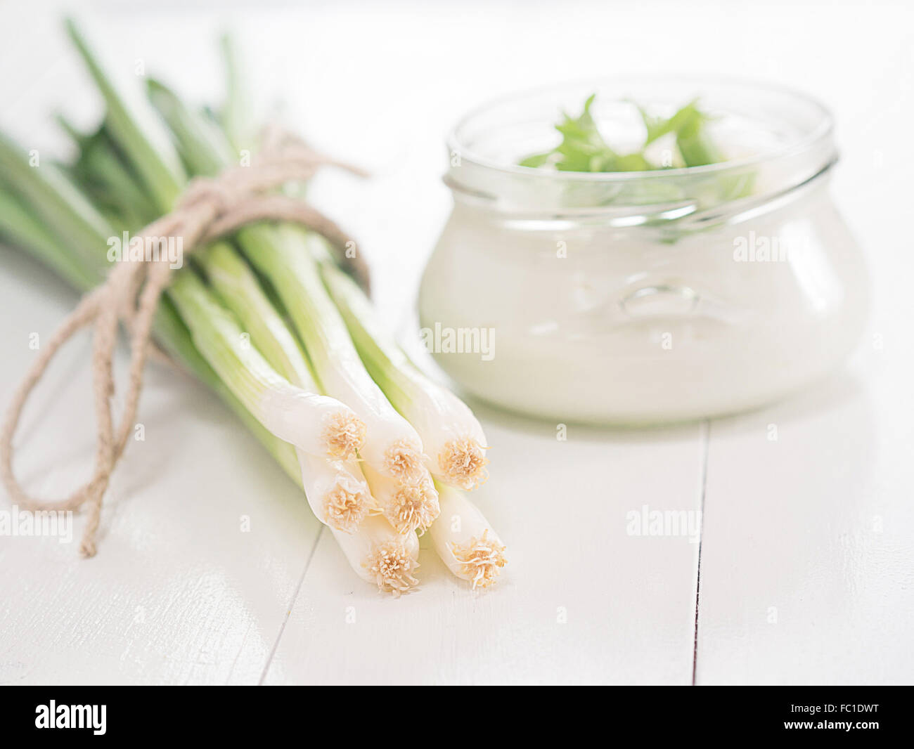 Spring onions on a tray Stock Photo - Alamy