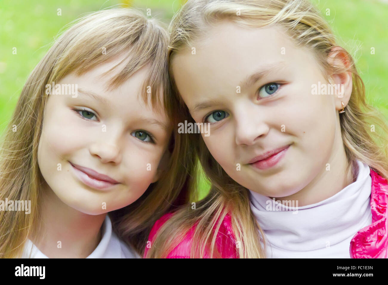 Cute two girls Stock Photo - Alamy