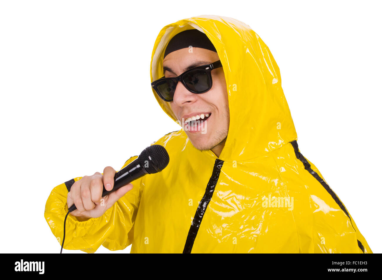 Funny performer with mic isolated on the white Stock Photo - Alamy