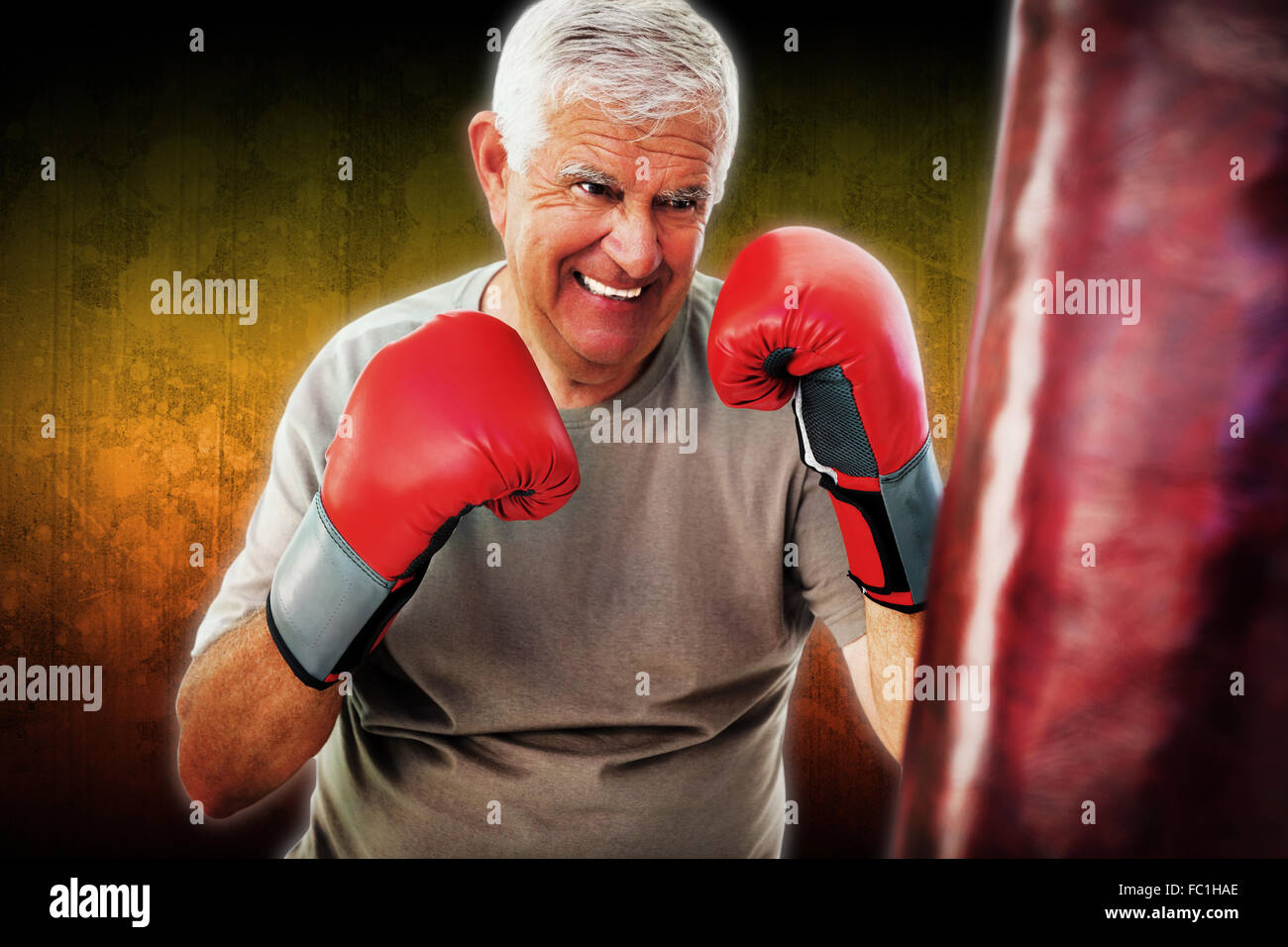 Composite image of portrait of a determined senior boxer Stock Photo ...