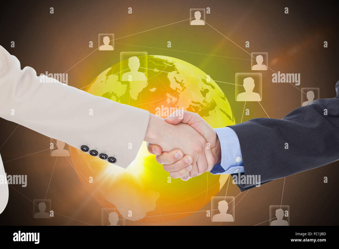 Composite image of smiling business people shaking hands while looking ...
