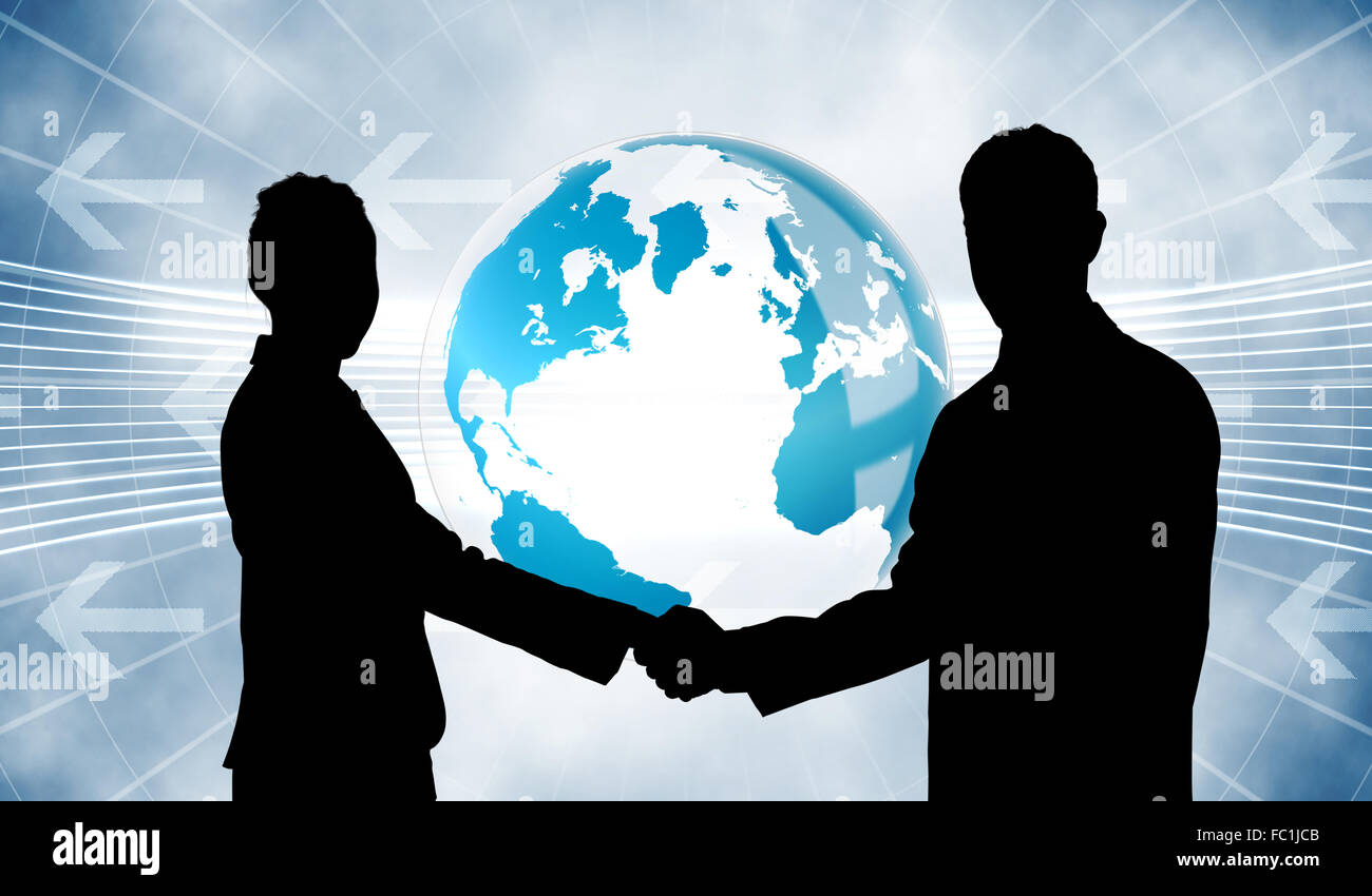 Composite image of smiling business people shaking hands while looking ...