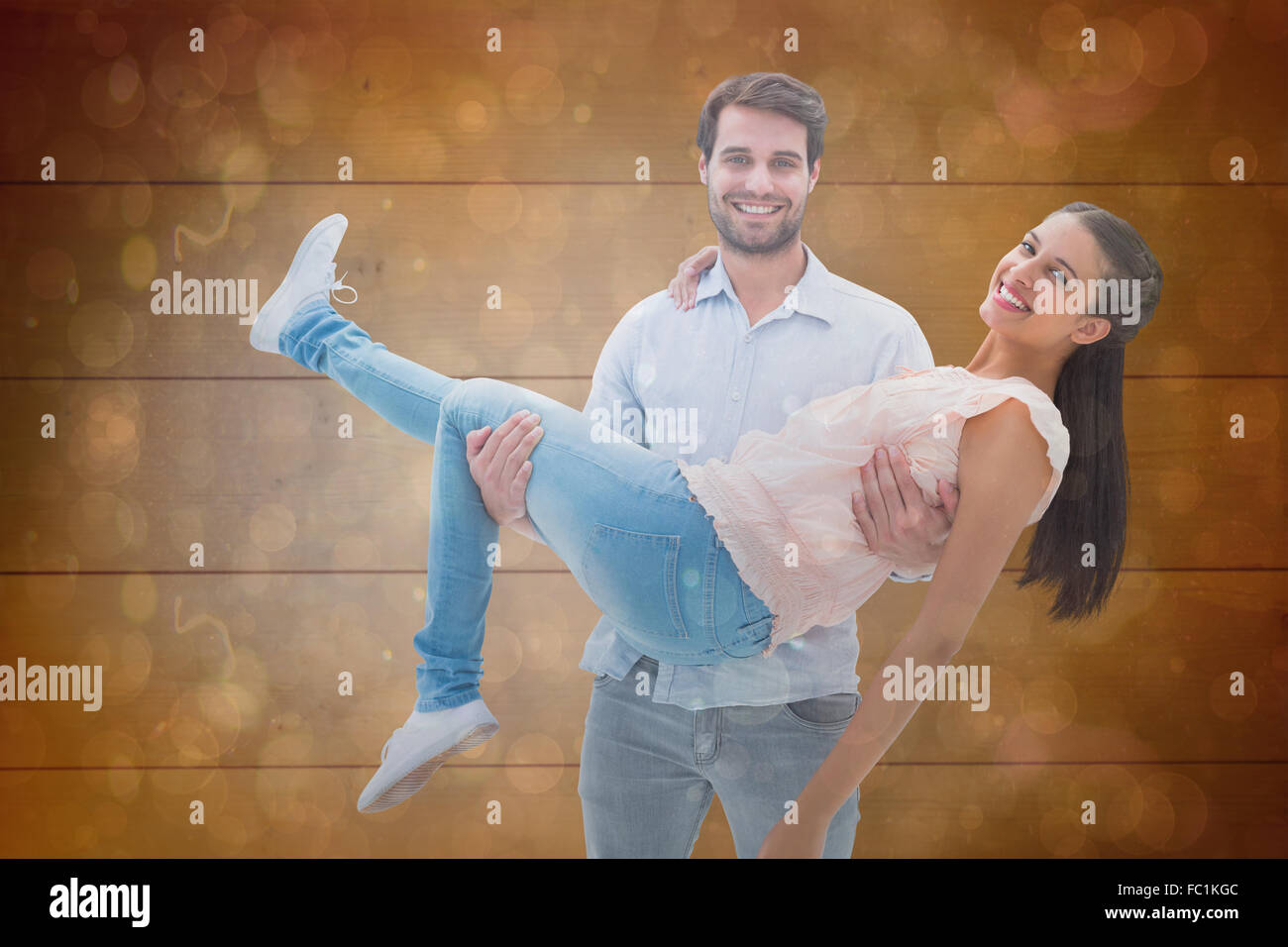 Composite image of attractive young couple having fun Stock Photo - Alamy