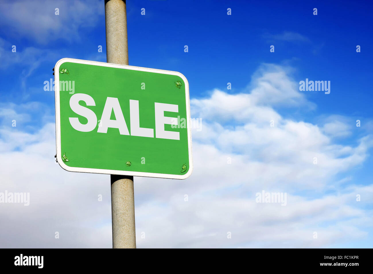 Green sale sign Stock Photo - Alamy