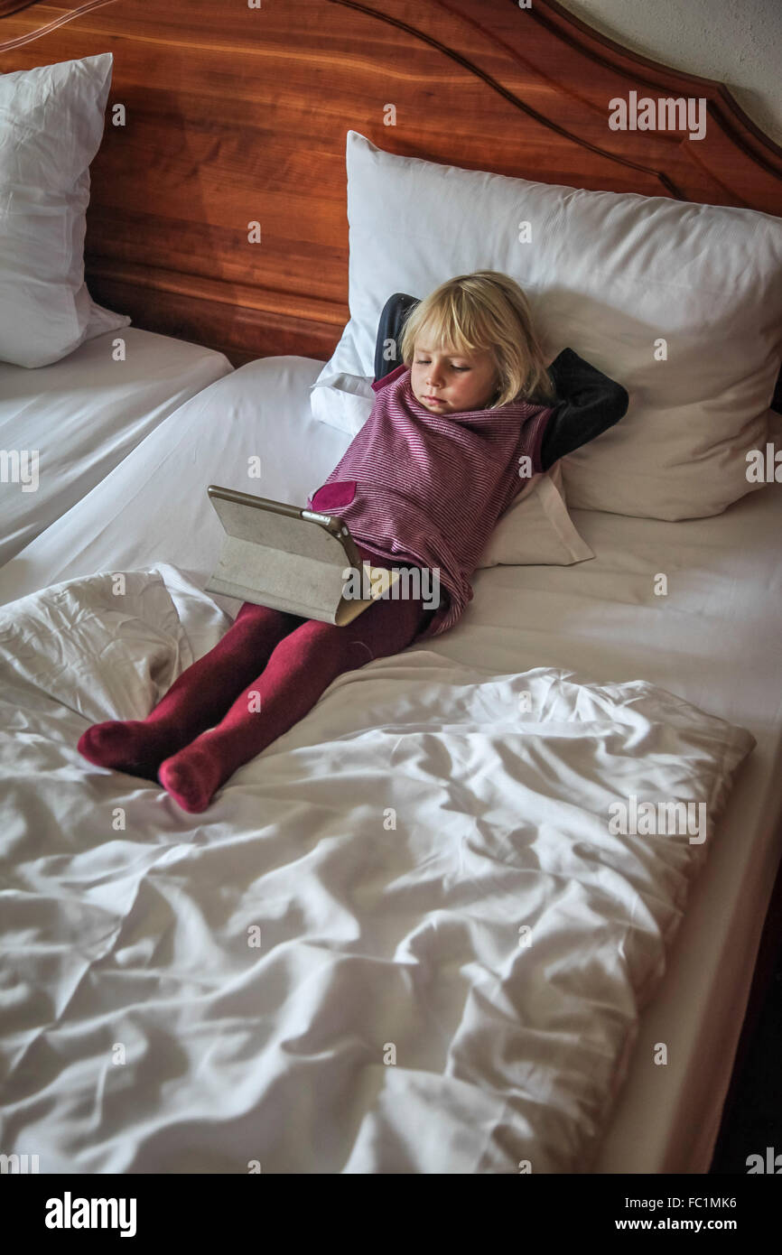 CHILD WITH TABLET Stock Photo - Alamy