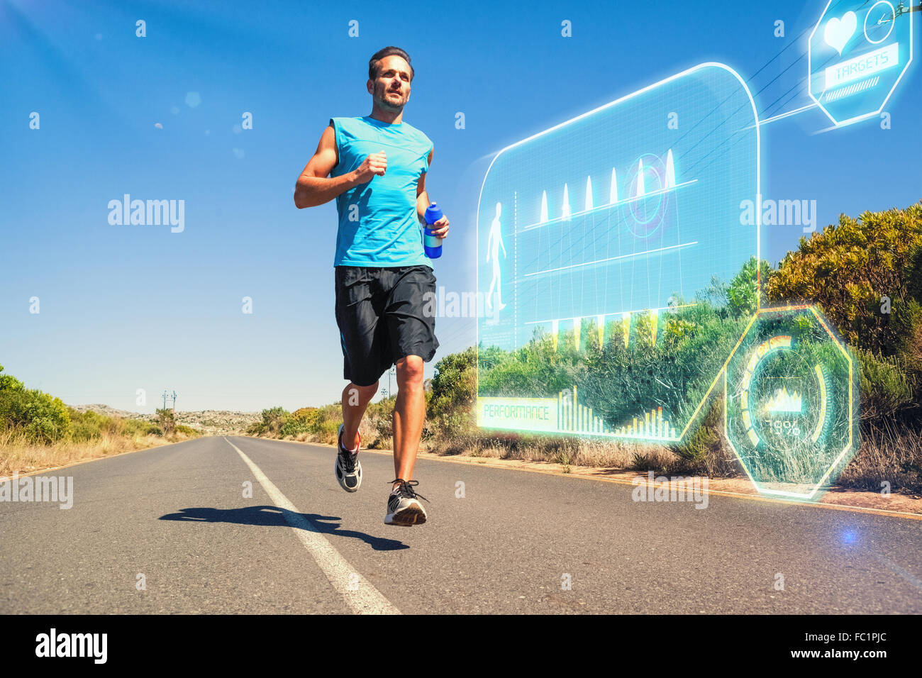 Composite image of athletic man jogging on open road holding bottle Stock Photo - Alamy