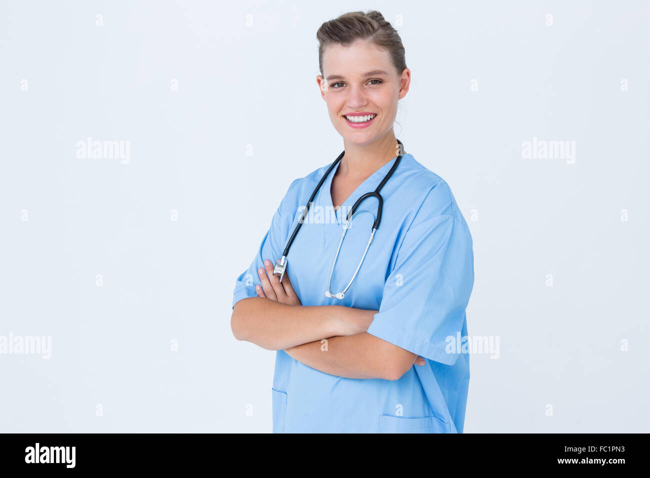 Happy nurse arms crossed hi-res stock photography and images - Alamy