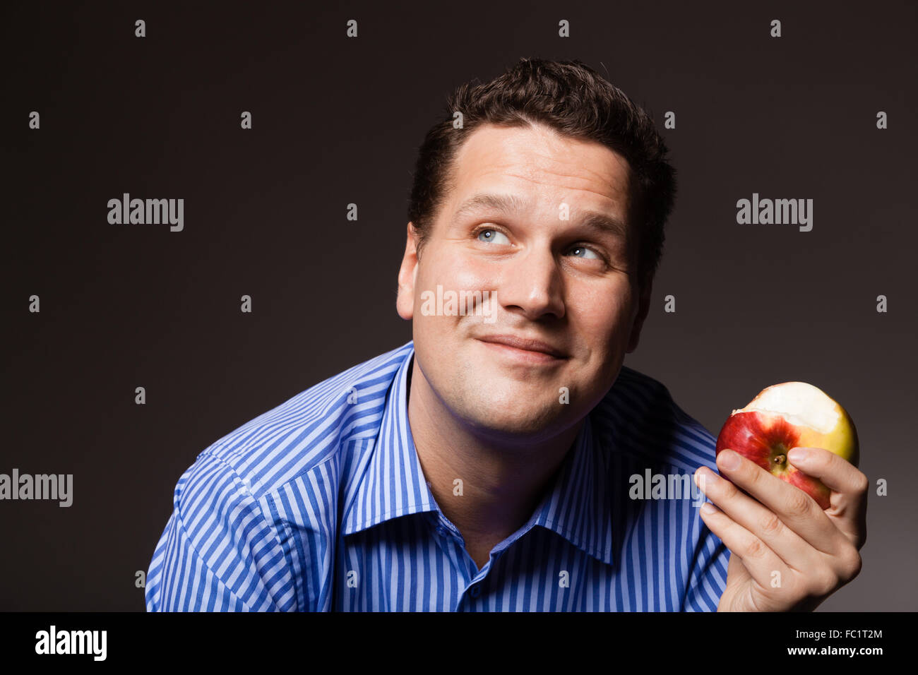 Man eating fruit not woman hi-res stock photography and images - Alamy