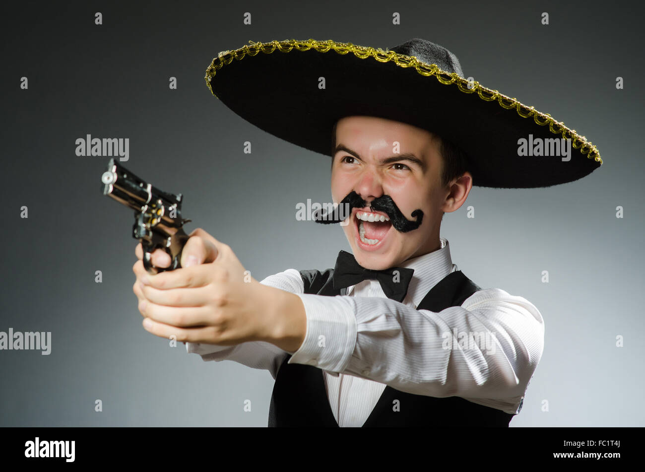 Smiling mexican with sombrero isolated on white Stock Photo - Alamy