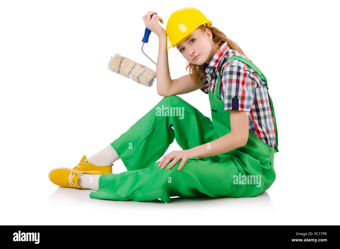 Female handyman in overalls isolated on white Stock Photo - Alamy