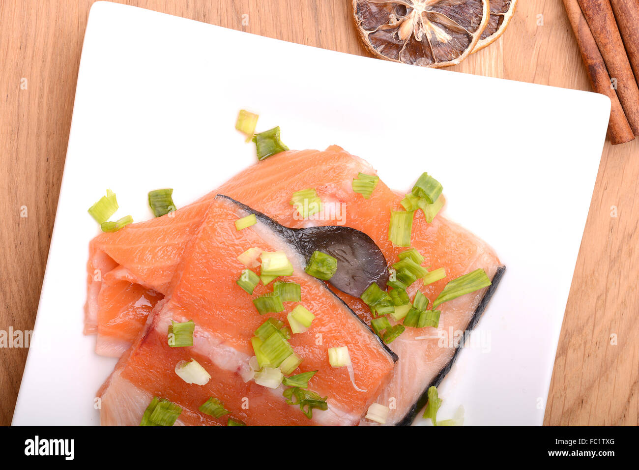 Slice of red fish salmon with cinnamon Stock Photo - Alamy