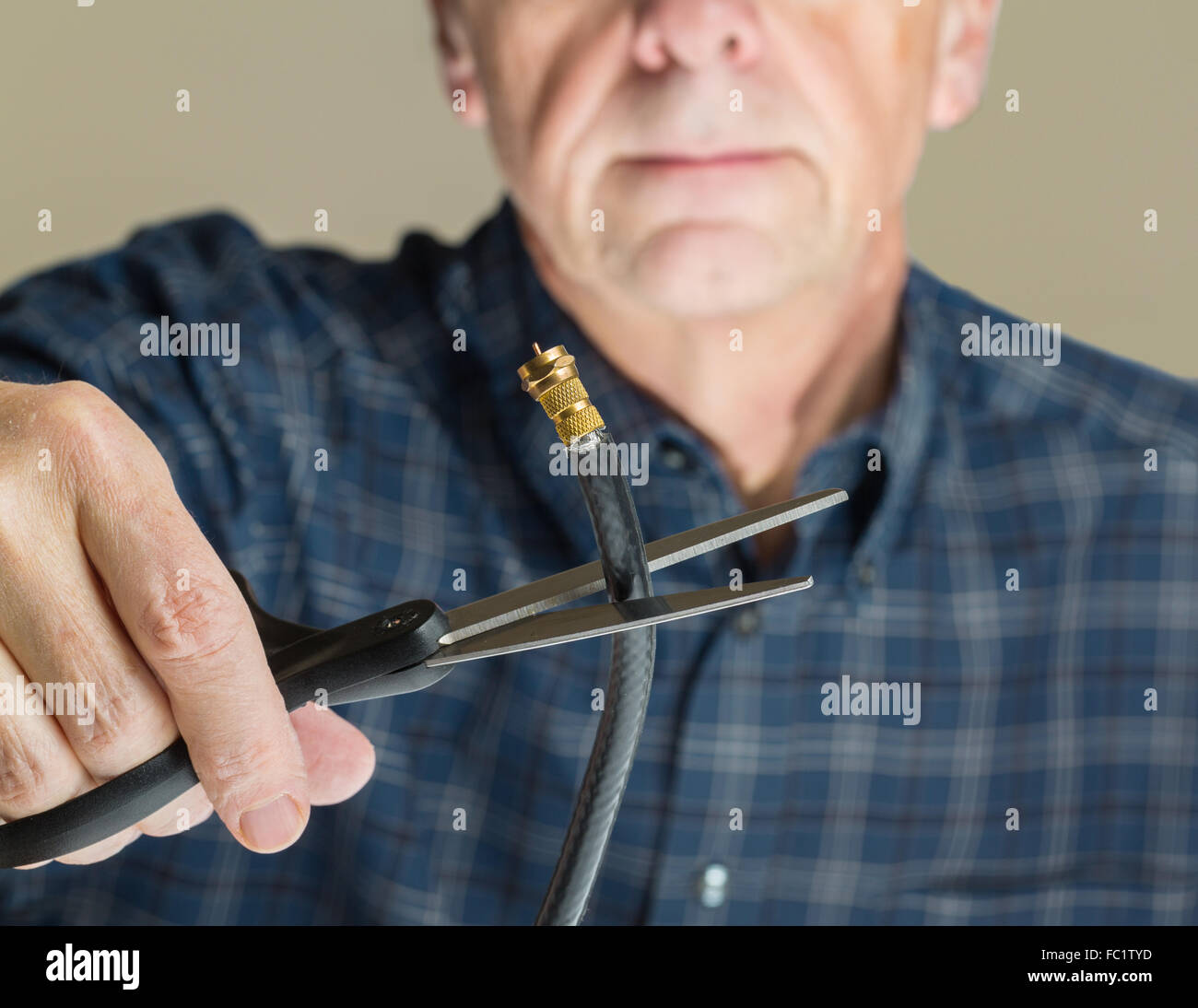 Concept isolated photo of cutting cable cord Stock Photo - Alamy