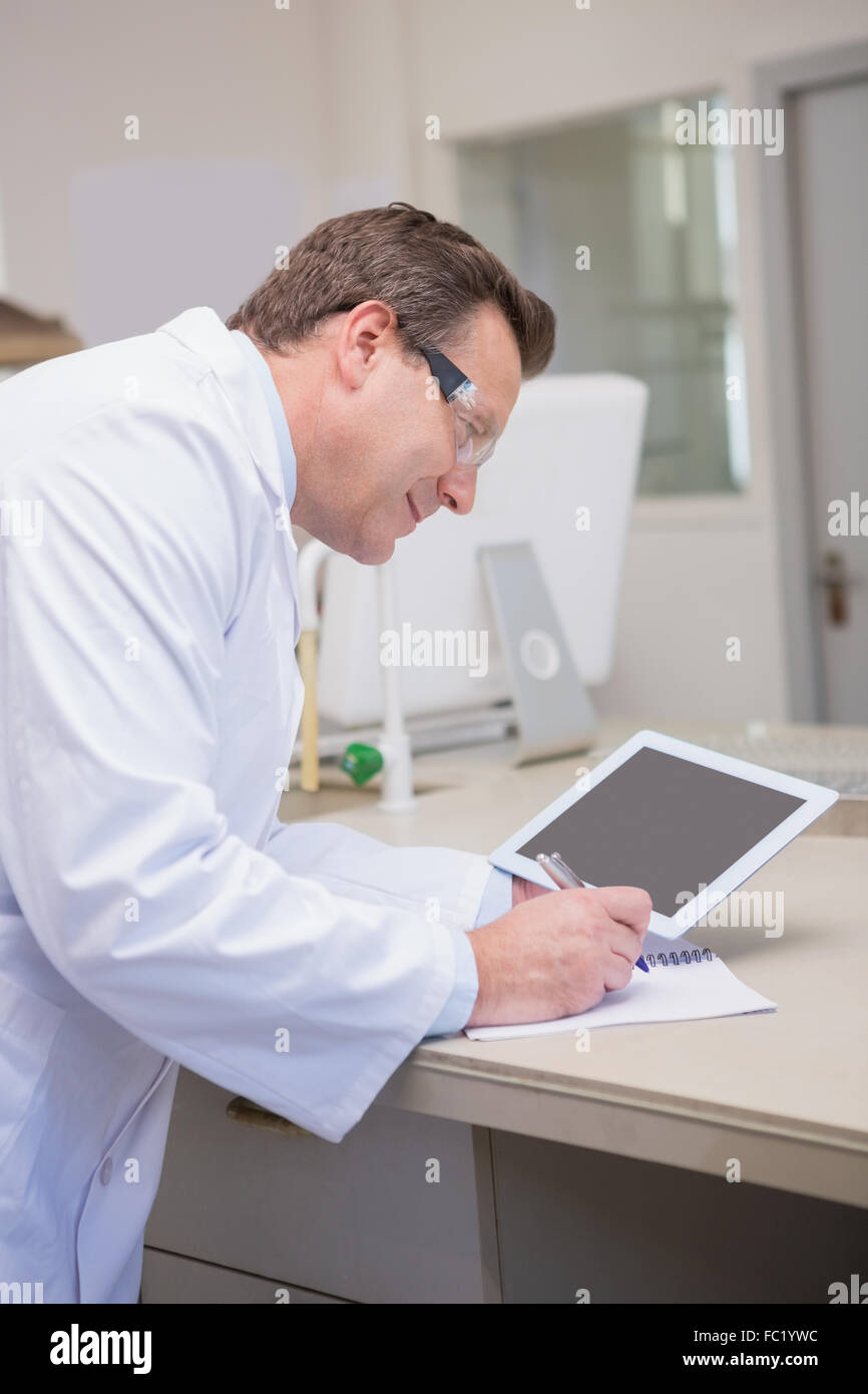 Scientist writing tablet hi-res stock photography and images - Alamy