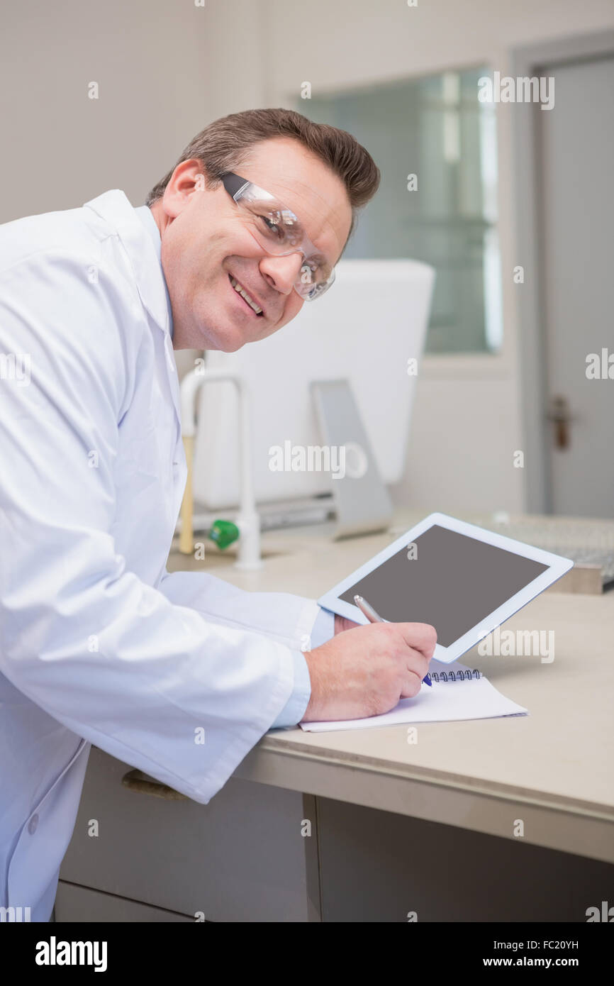 Scientist writing tablet hi-res stock photography and images - Alamy