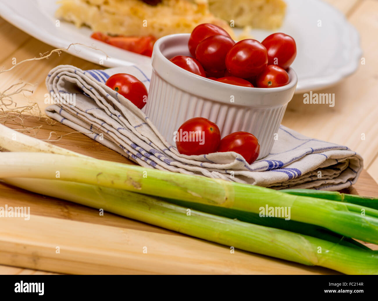 More cherry tomato on wood table food background Stock Photo - Alamy
