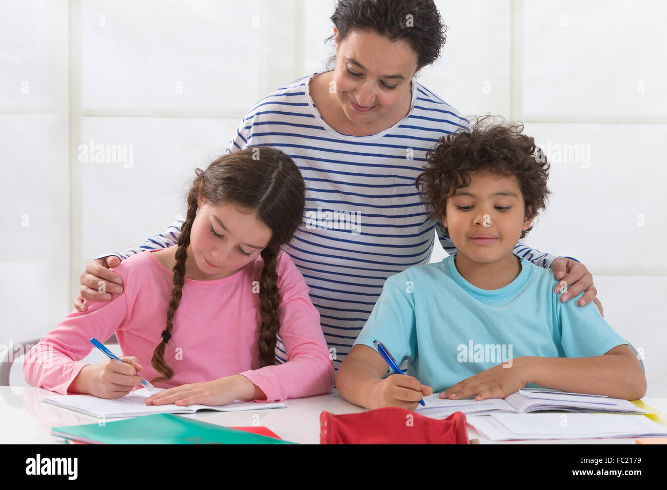 Boy Doing Homework Mom High Resolution Stock Photography and Images - Alamy
