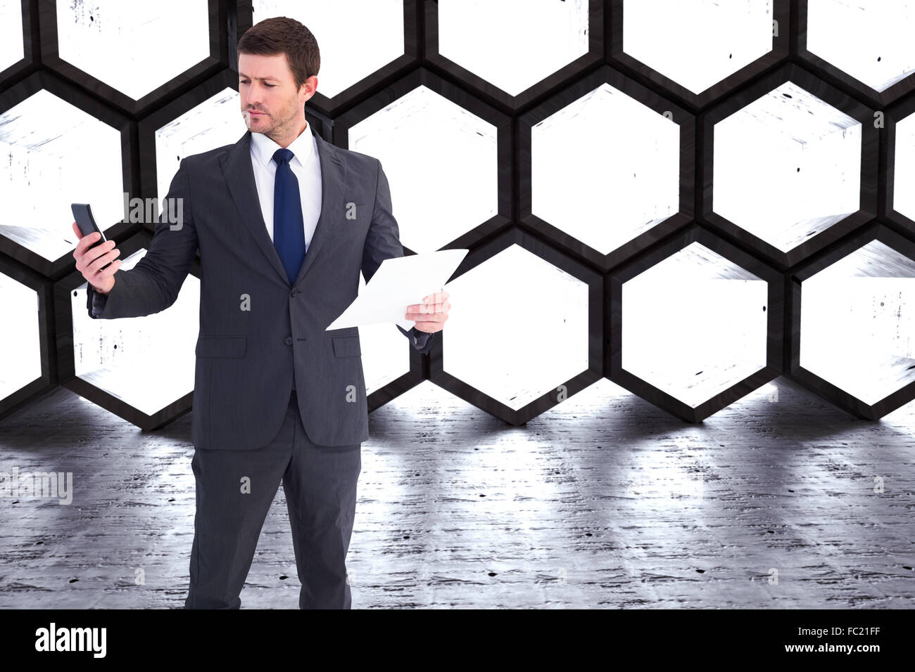 Composite image of businessman sending text holding page Stock Photo ... Composite image of businessman sending text holding page Stock Photo ...