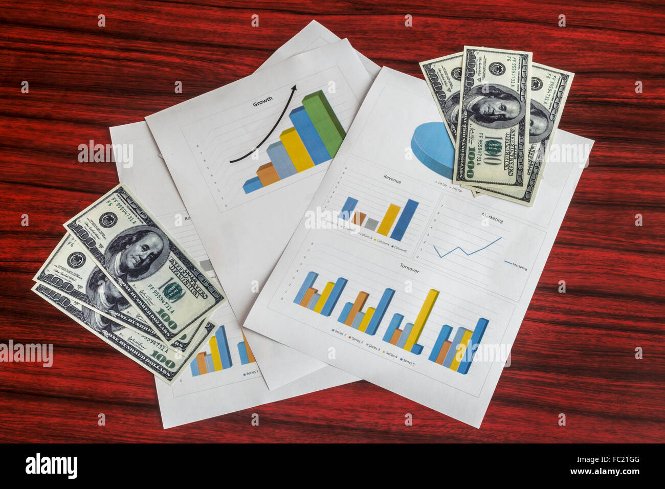 Bunch of printed charts and graphs with dollar bills on them Stock ...