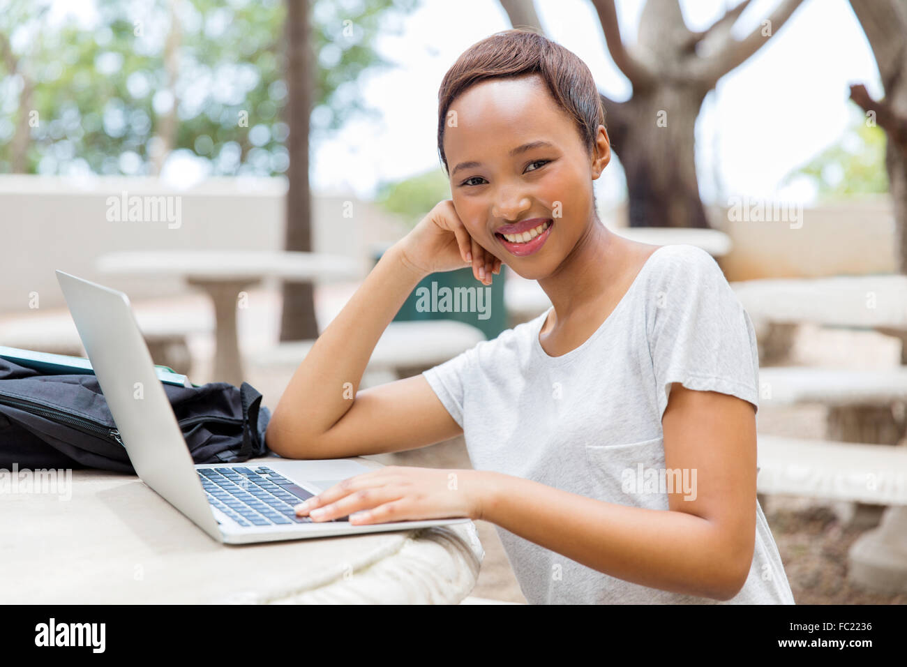 Black girl using laptop school hi-res stock photography and images - Alamy