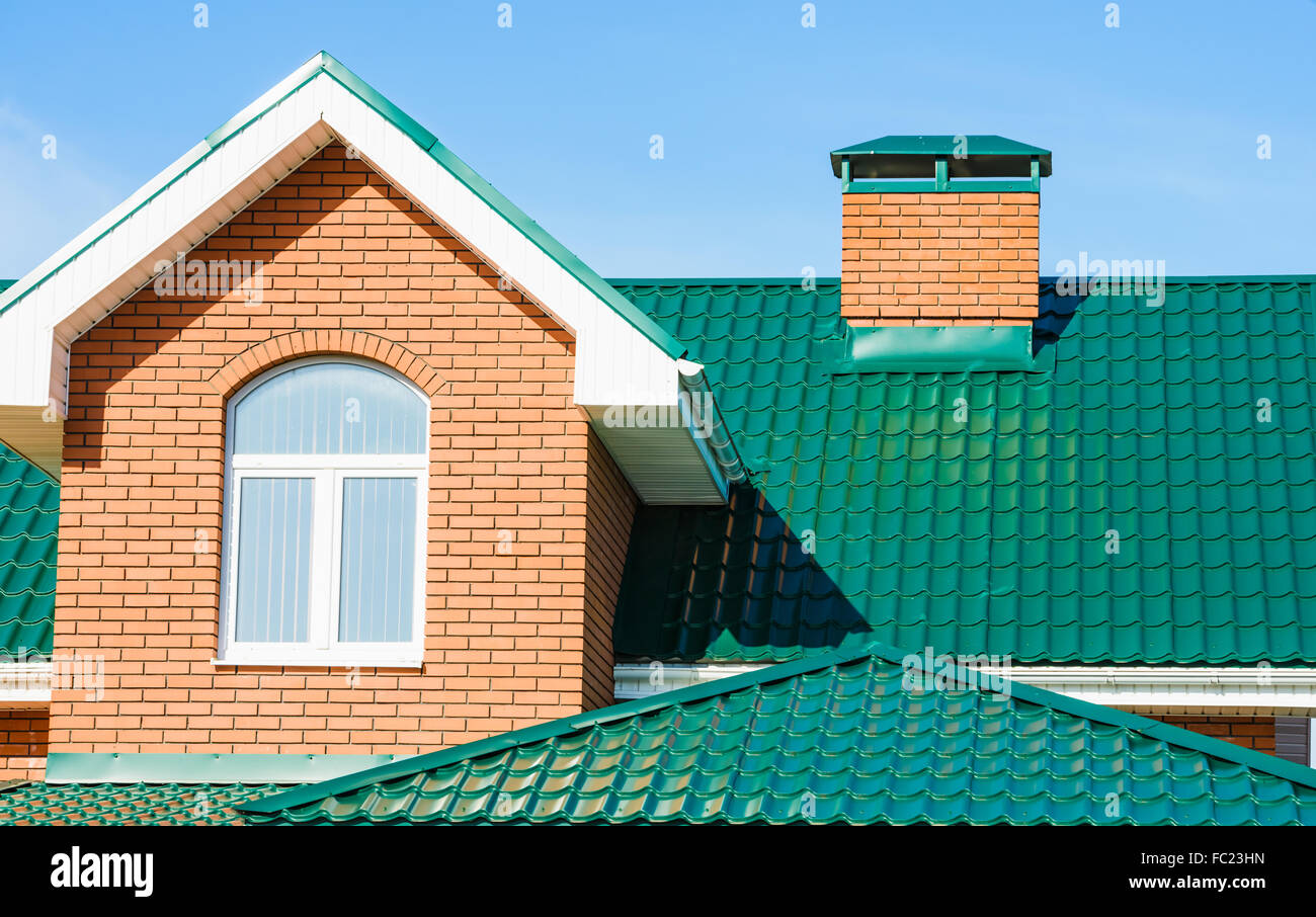 house with a gable roof window Stock Photo - Alamy