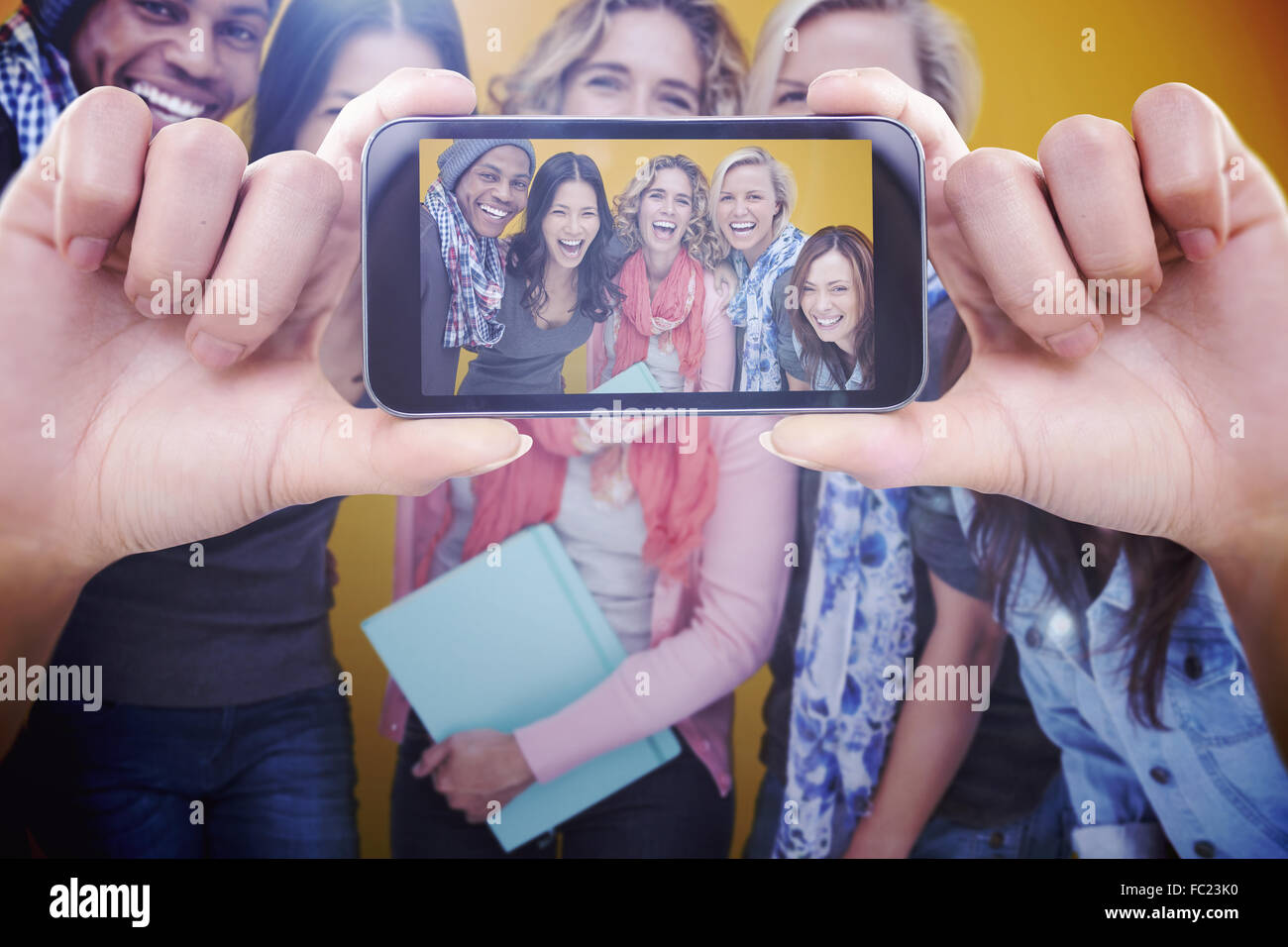 Composite image of hand holding smartphone showing Stock Photo - Alamy